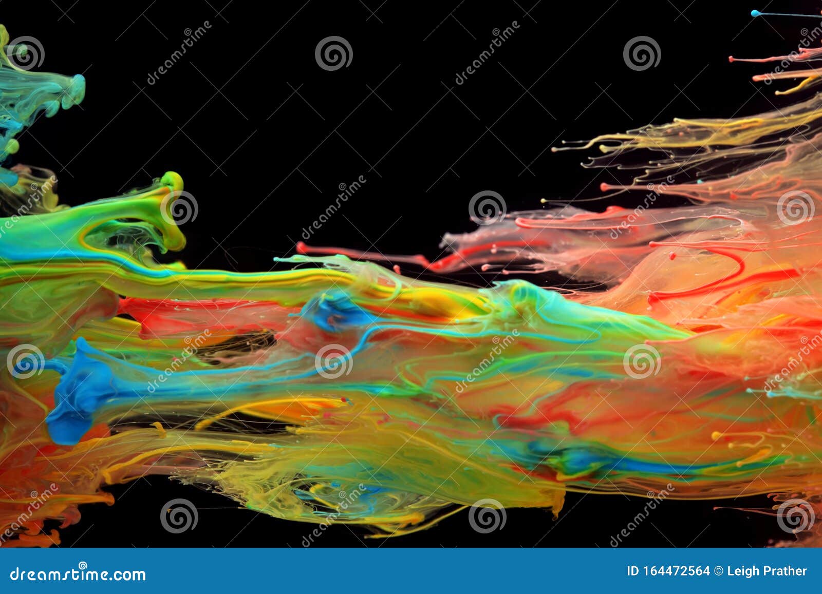 Colorful Ink Swirling through Water Stock Photo - Image of blend, fluid ...