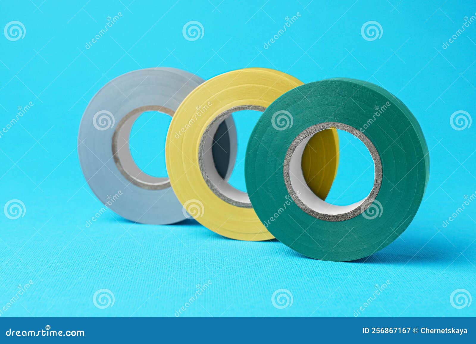 Colorful Insulating Tapes on Light Blue Background Stock Image - Image ...