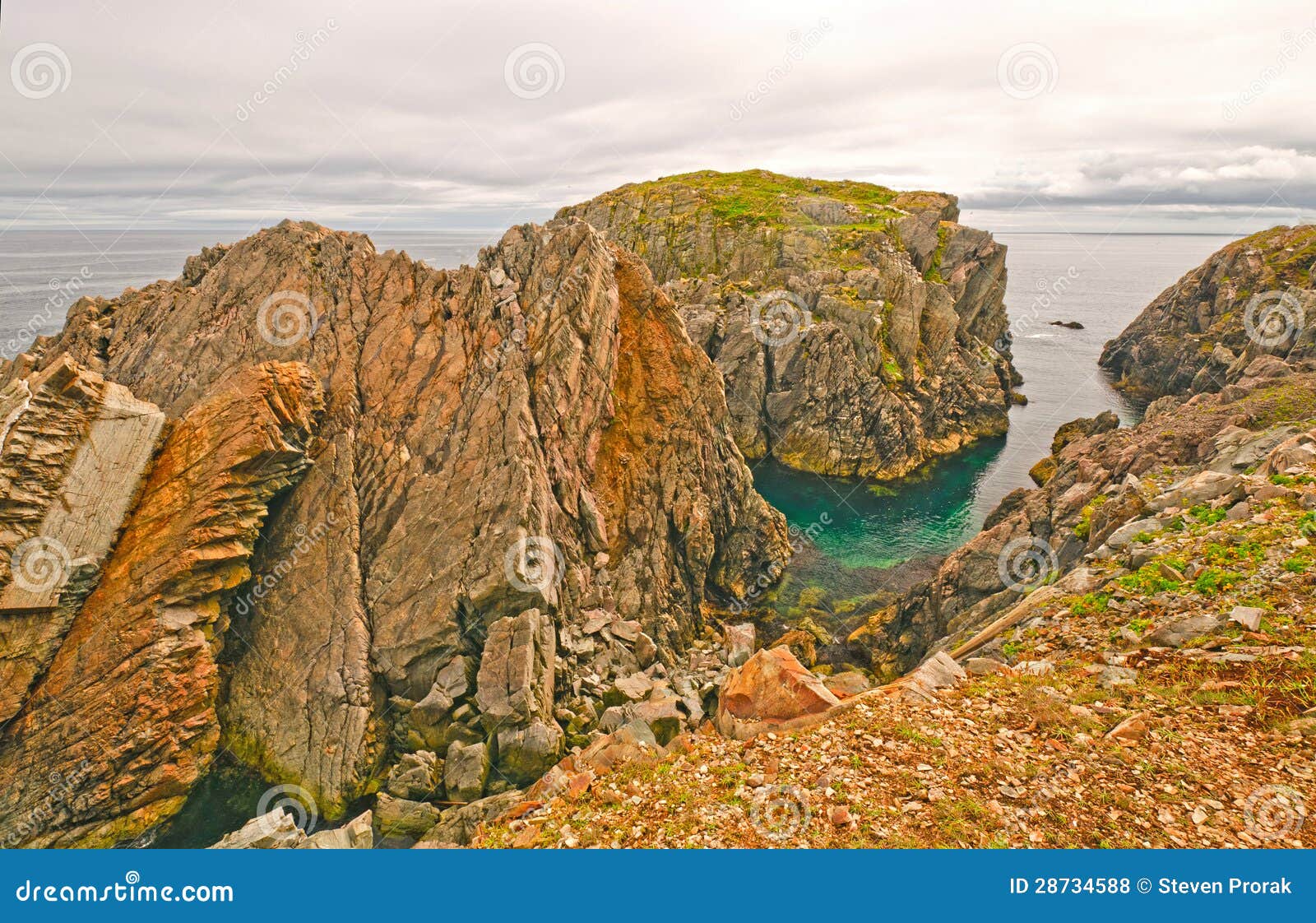 Colorful Jagged Rocks on an Ocean Coast Stock Photo - Image of coast ...
