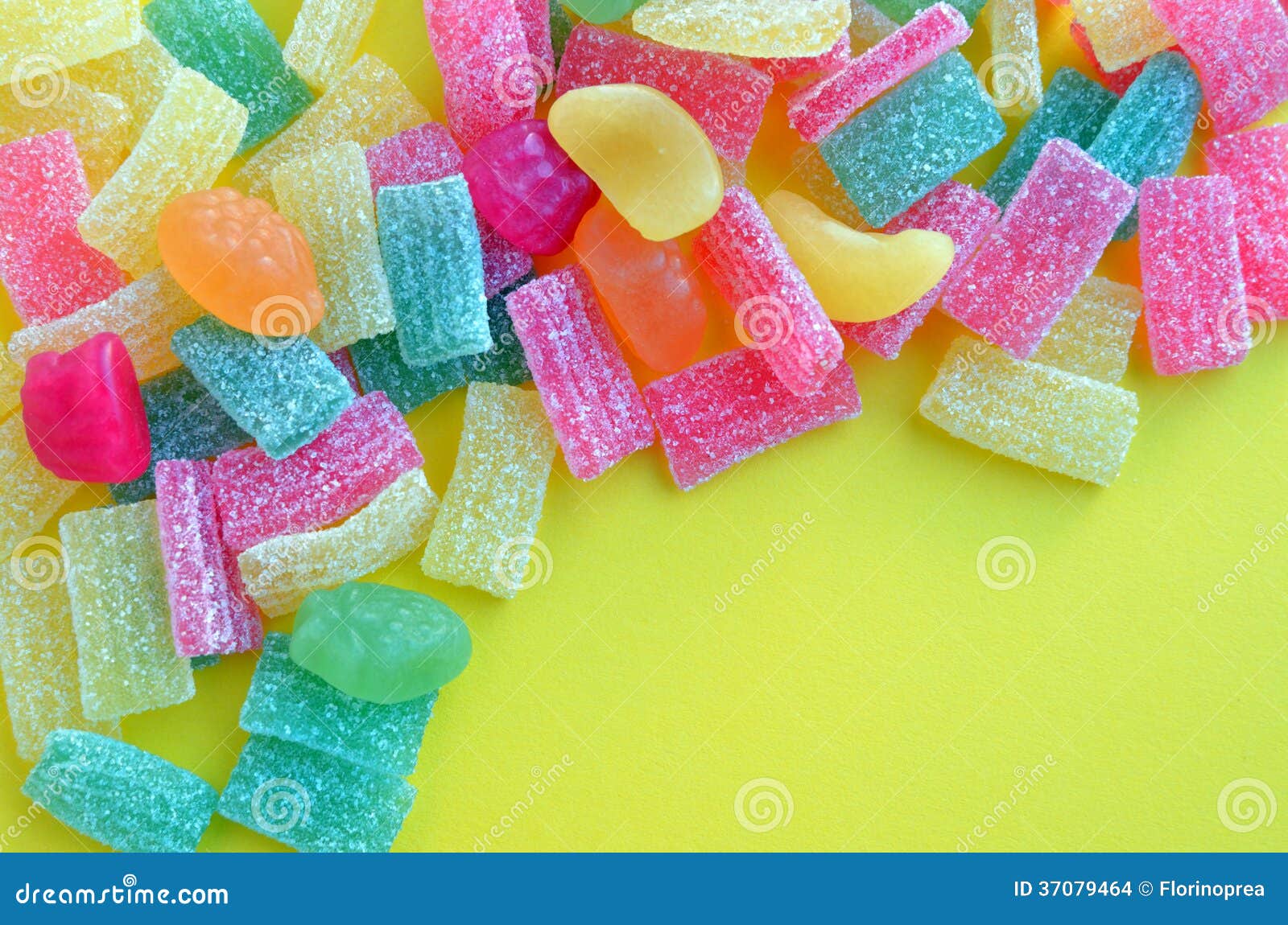 Colorful Jelly Candies on Yellow Stock Photo - Image of object, stack ...