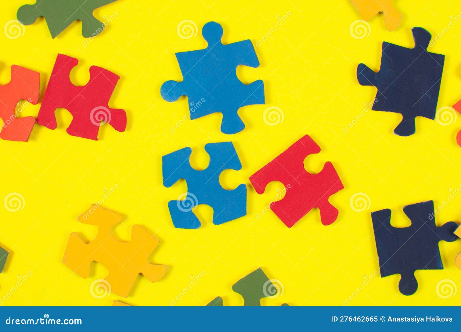 Colorful Jigsaw Puzzle Pieces on Yellow Background. Top View Stock ...