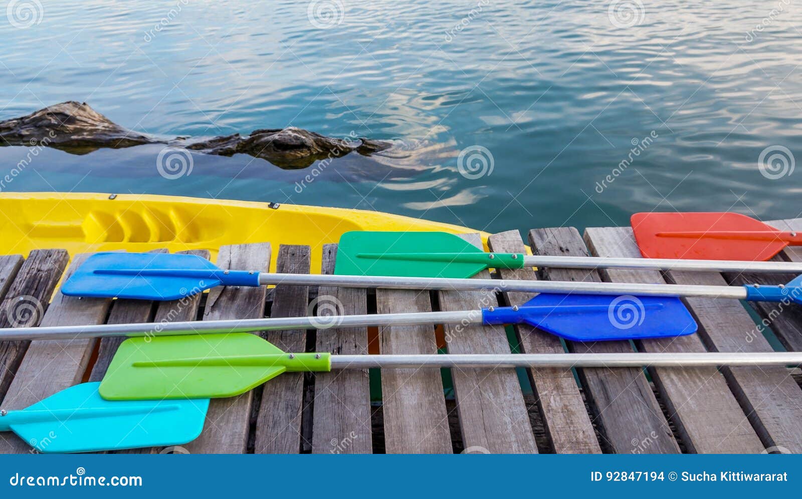 Colorful Kayak and Paddle in the Lake Stock Photo - Image of lake ...