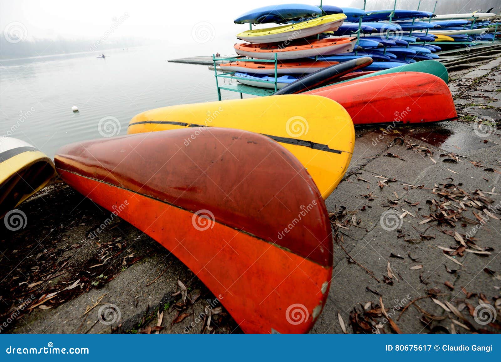Colorful Kayaks and Canoes in a Row Stack Stock Image - Image of ...