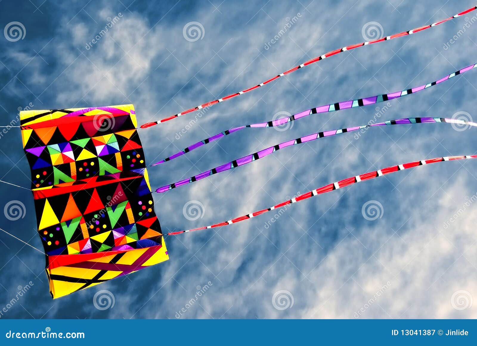 Colorful kite in blue sky stock image. Image of wind - 13041387