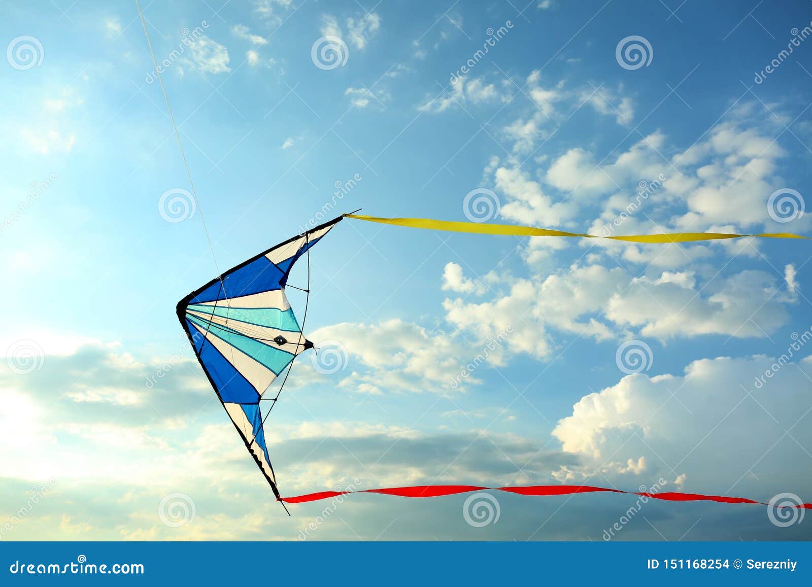 Colorful Kite Flying in Blue Sky Stock Photo - Image of drifting ...