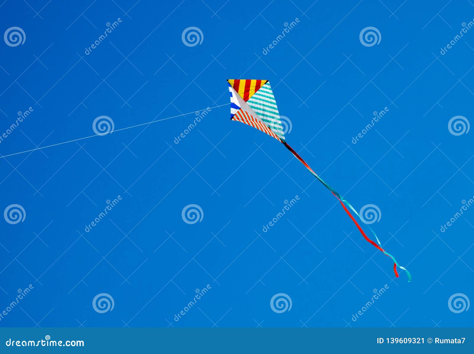 Colorful Kite Flying in Blue Sky Stock Image - Image of flying, leisure ...