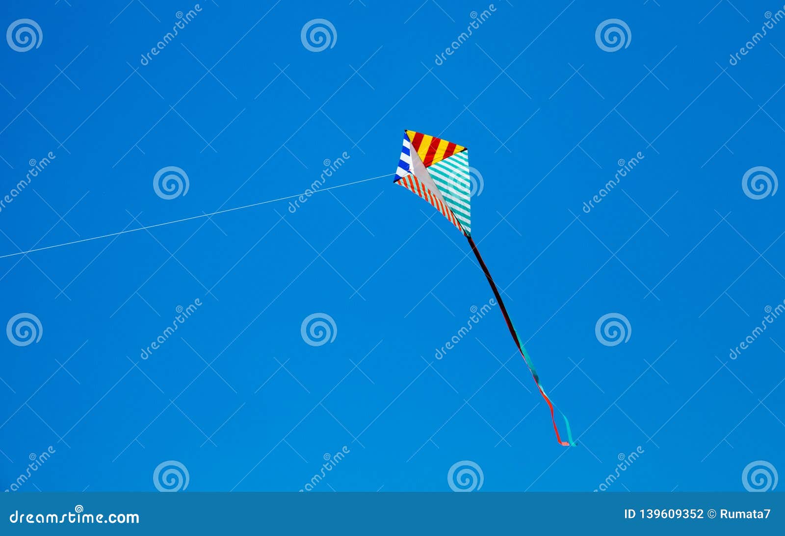 Colorful Kite Flying in Blue Sky Stock Photo - Image of float, multi ...