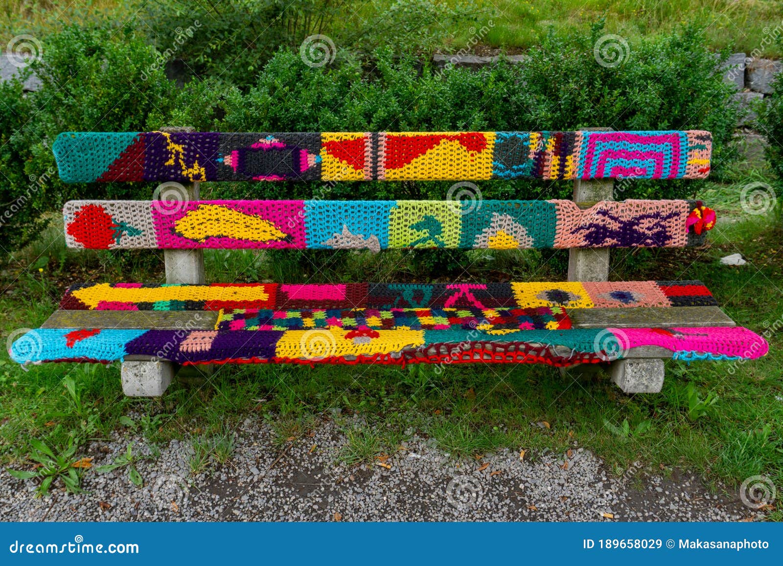 Colorful Knitting Covering a Park Bench Stock Image - Image of knitted ...