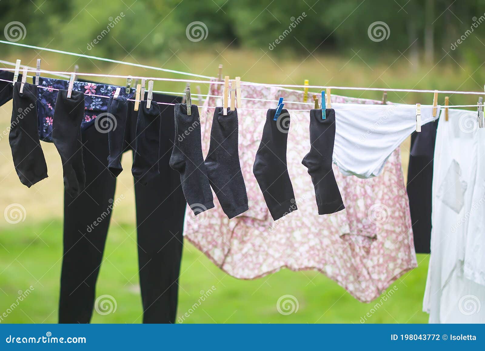 Colorful Laundry Hanging on the Rope Outdoors Stock Photo - Image of ...