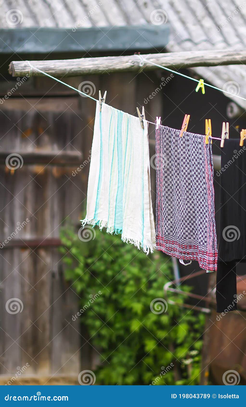 Colorful Laundry Hanging on the Rope Outdoors Stock Image - Image of ...