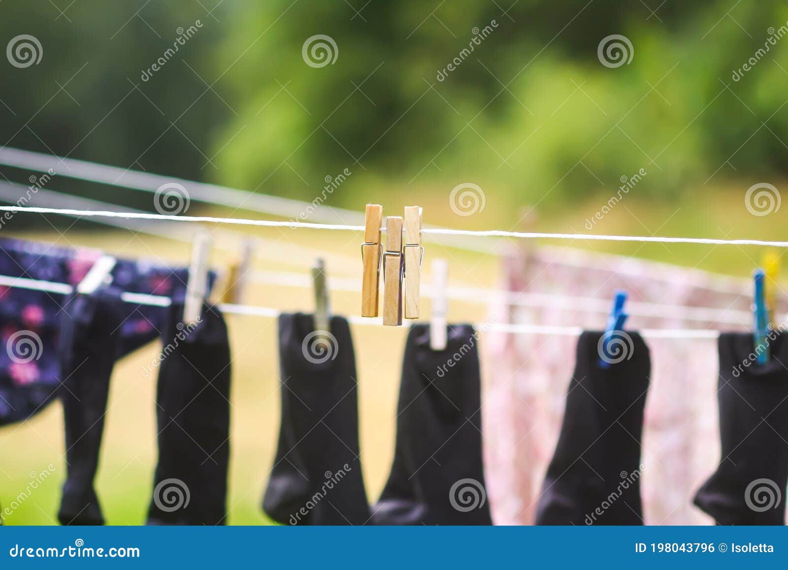 Colorful Laundry Hanging on the Rope Outdoors Stock Photo - Image of ...
