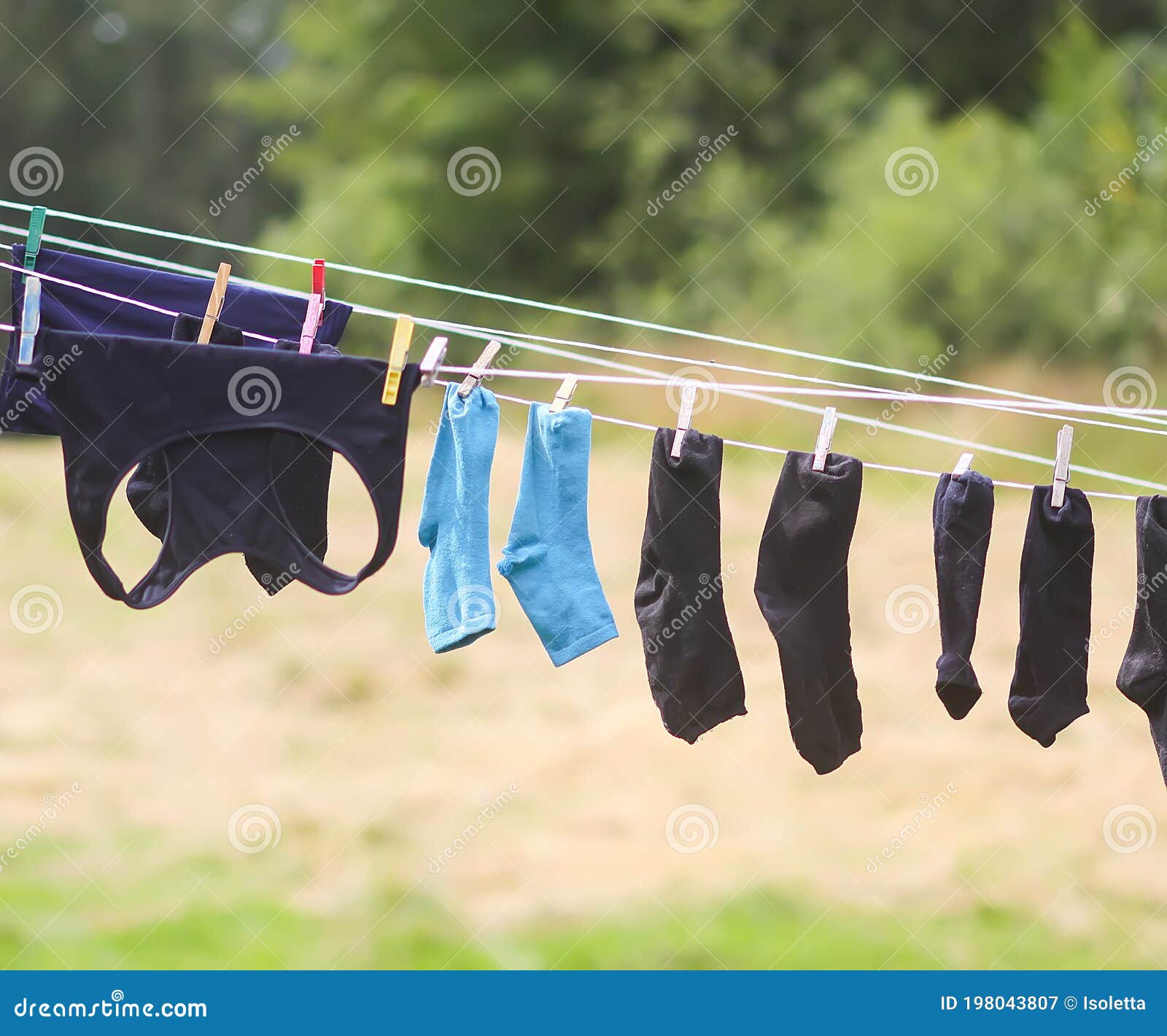 Colorful Laundry Hanging on the Rope Outdoors Stock Image - Image of ...