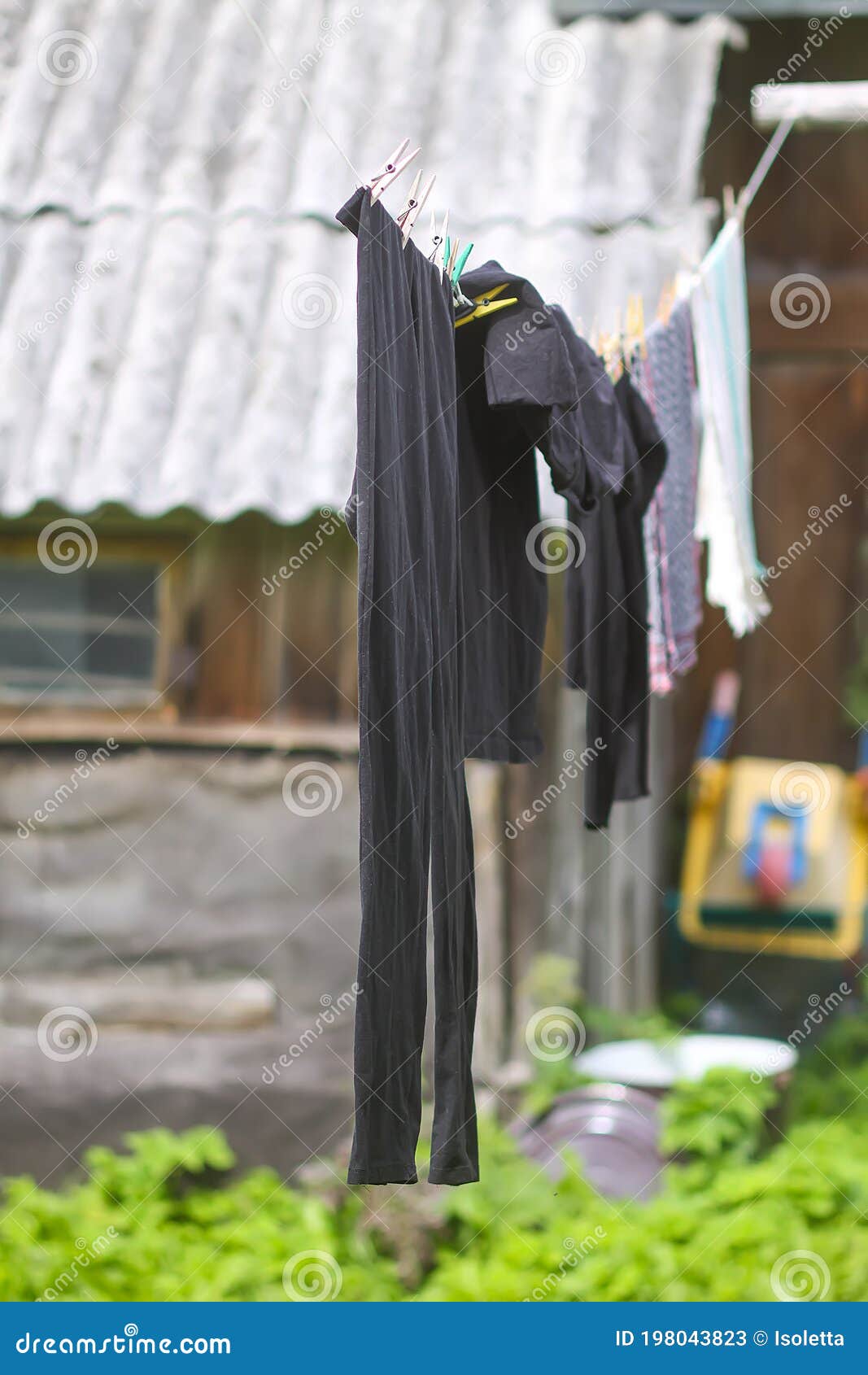 Colorful Laundry Hanging on the Rope Outdoors Stock Image - Image of ...