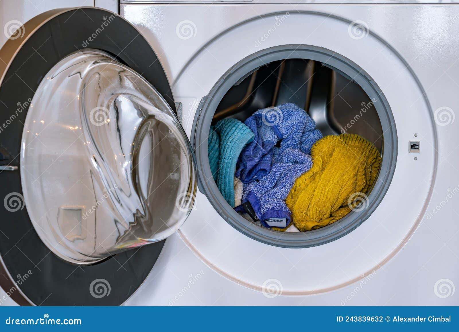 Colorful Laundry Inside a Front Loader Washing Machine Stock Photo ...