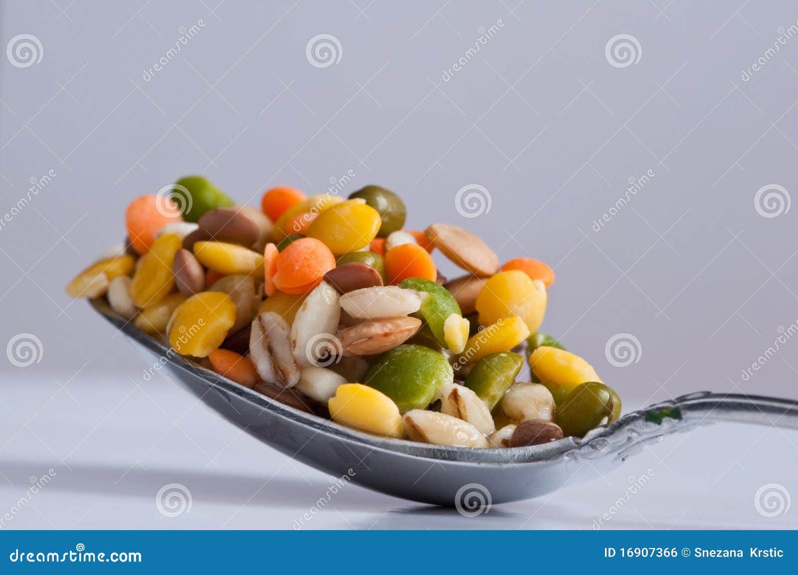 Colorful lentis in spoon stock photo. Image of ingredient - 16907366