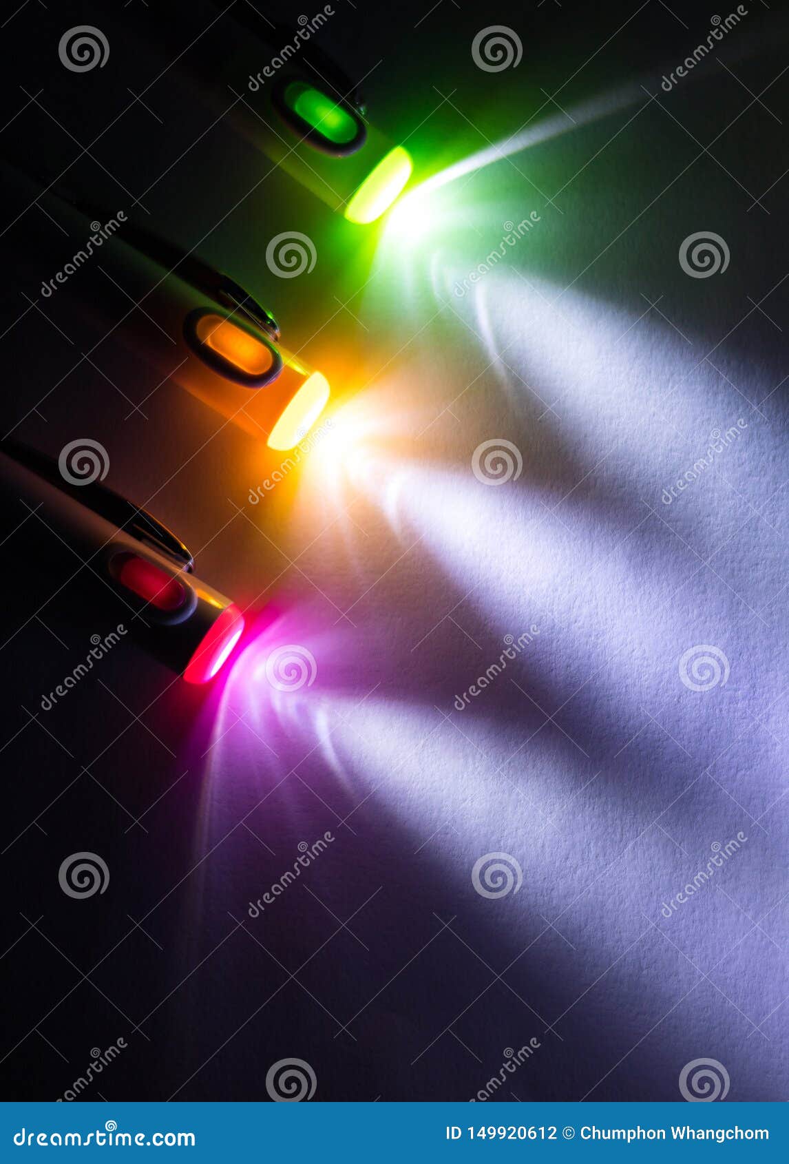 Colorful Light Beam of Flashlight Pen on Dark Background Stock Photo ...