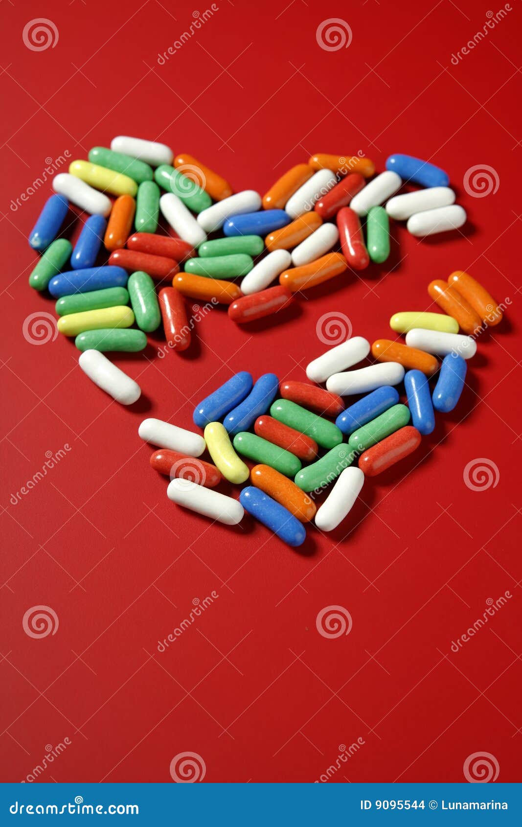 Colorful Little Candy Sweets Over Red Stock Photo - Image of orange ...