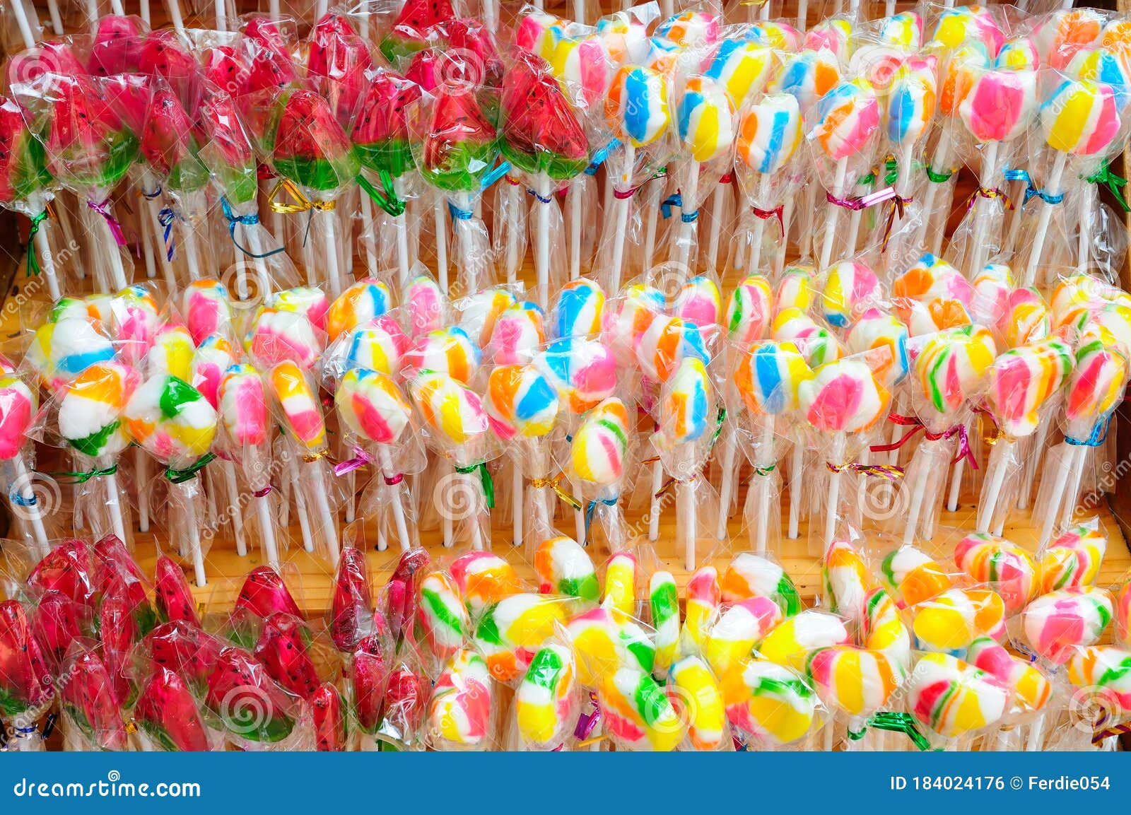 A Stack of Colorful Lollipop Candies Stock Photo - Image of standing ...