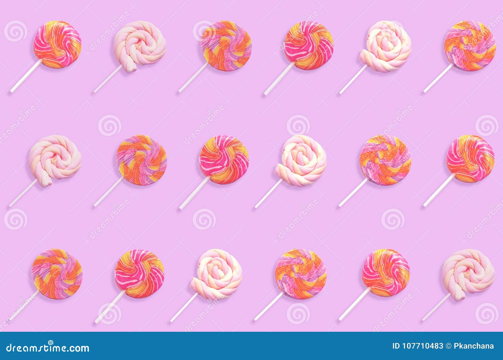Colorful Lollipop Candy on Violet Background. Stock Image - Image of ...