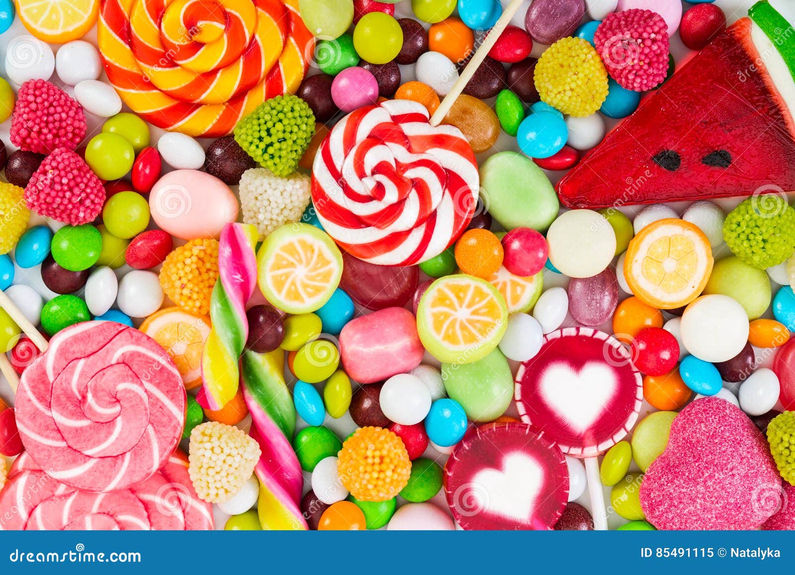 Colorful Lollipops and Different Colored Round Candy. Stock Image ...