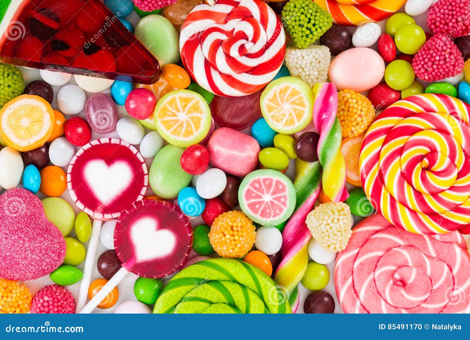 Colorful Lollipops and Different Colored Round Candy. Stock Photo ...