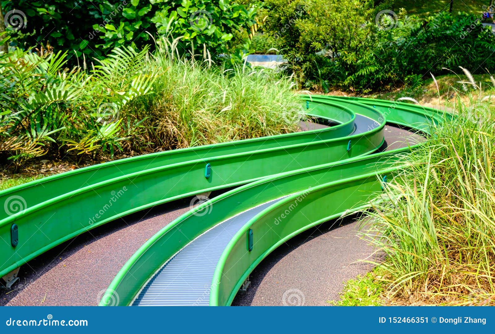 Colorful Long Slide View in Public Forest Playground Stock Image ...