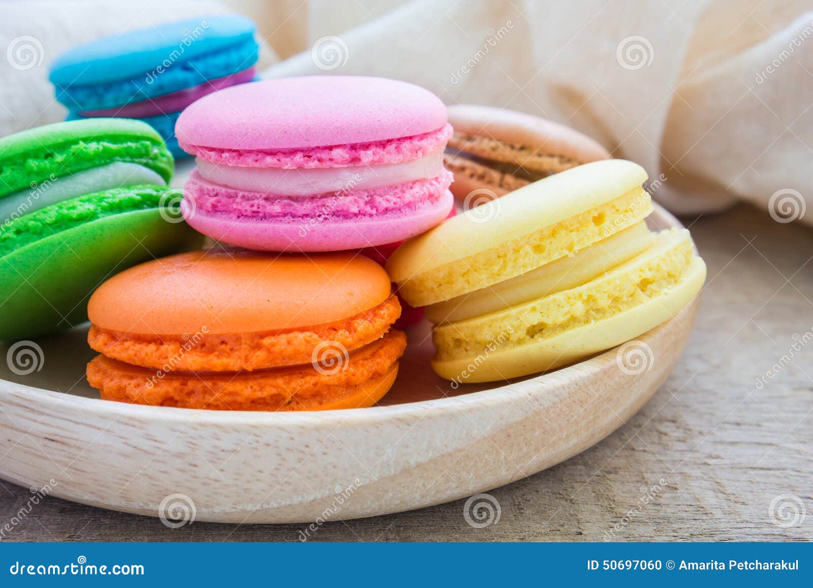 Colorful Macarons on Wooden Plate Stock Photo - Image of dessert, plate ...