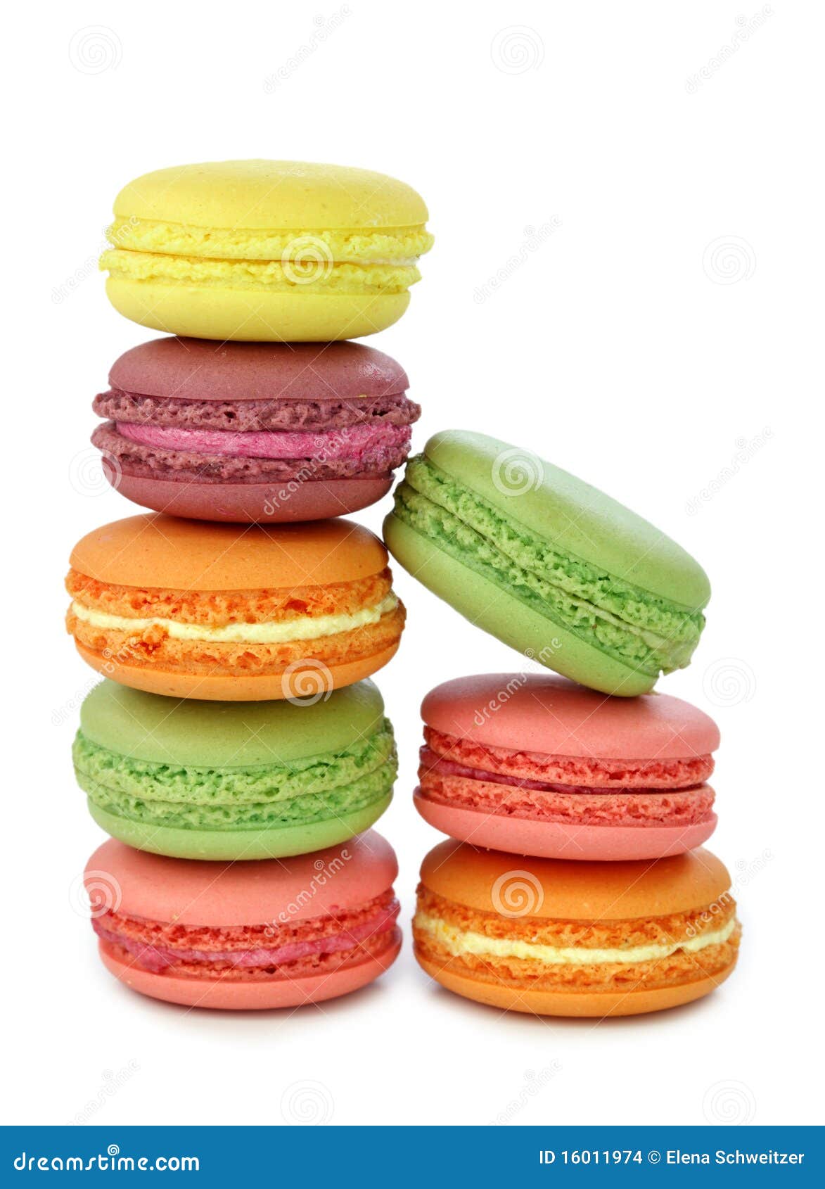 Colorful Macaroons With One Piece Half Eaten On Yellow Background ...