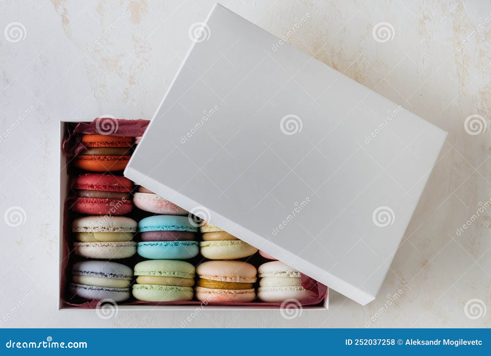 Colorful Macaroons in a Gift Box on a White Table. Stock Photo - Image ...