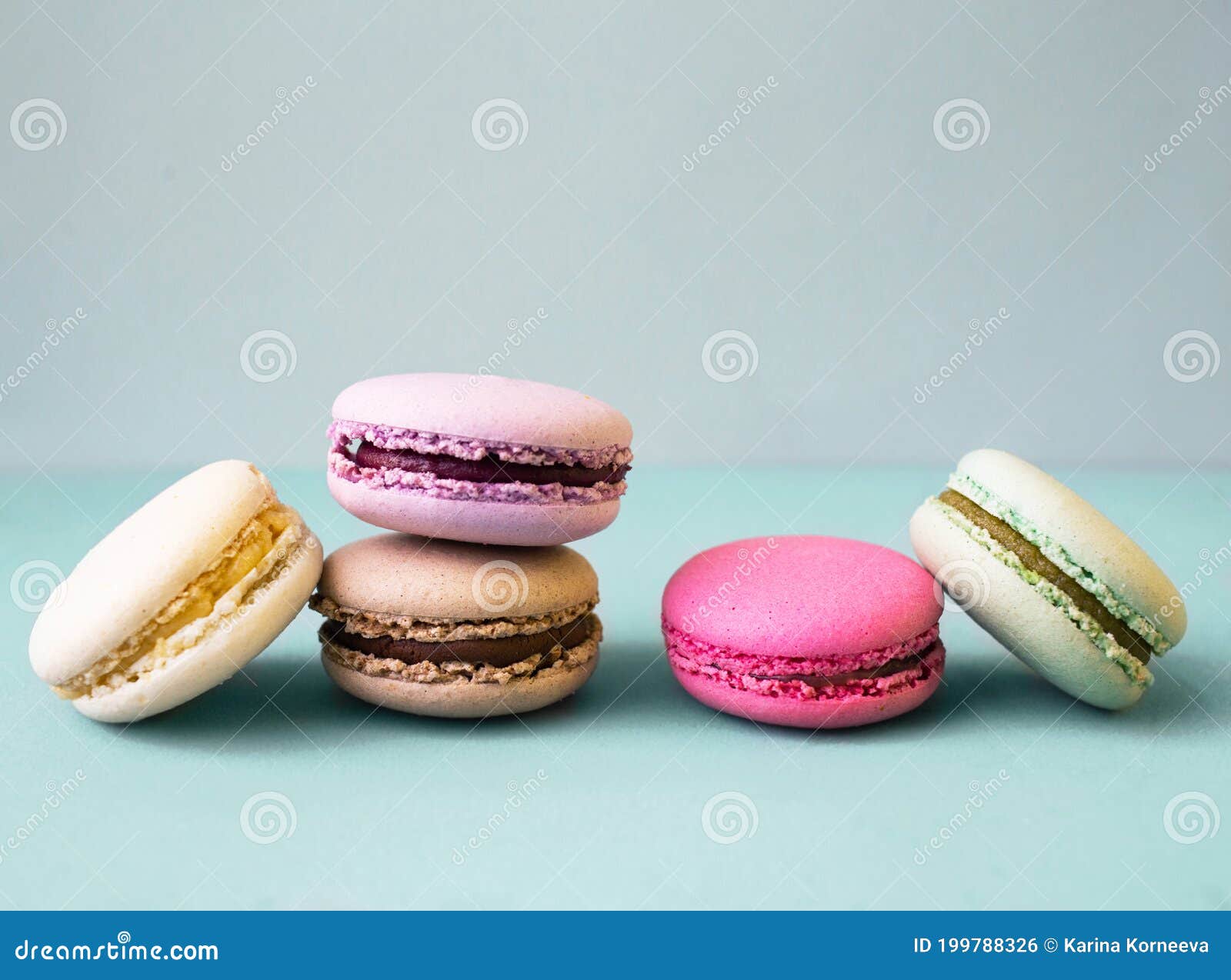 Colorful Macaroons or Macaron on Blue Background Stock Photo - Image of ...