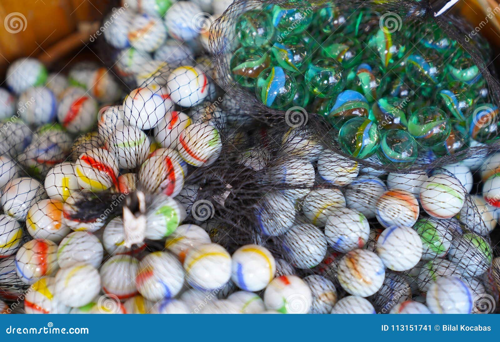 Colorful Marbles Stacked in a Net Stock Image - Image of stacked ...
