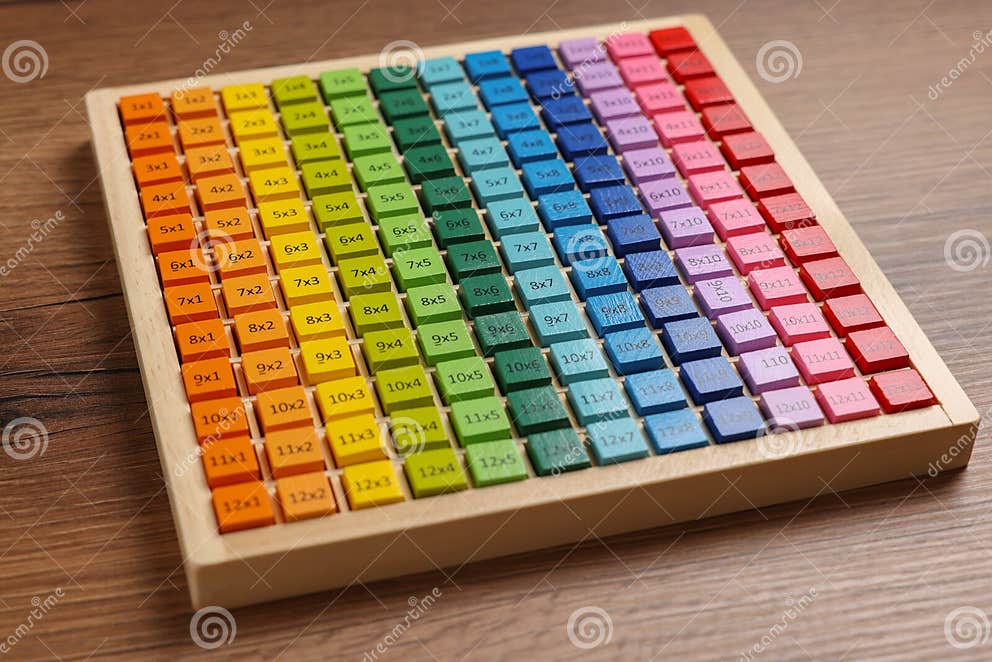 Colorful Math Game Kit with Arithmetical Tasks on Wooden Table Stock ...