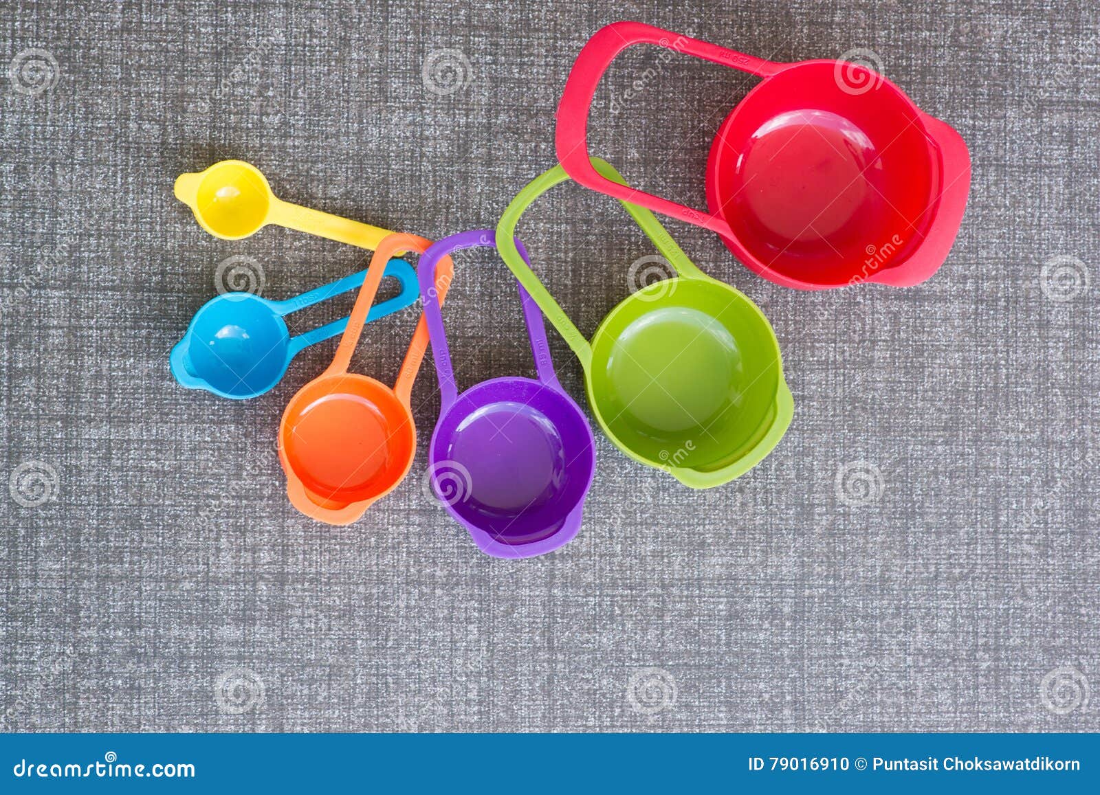 Colorful measuring cups stock photo. Image of equipment - 79016910