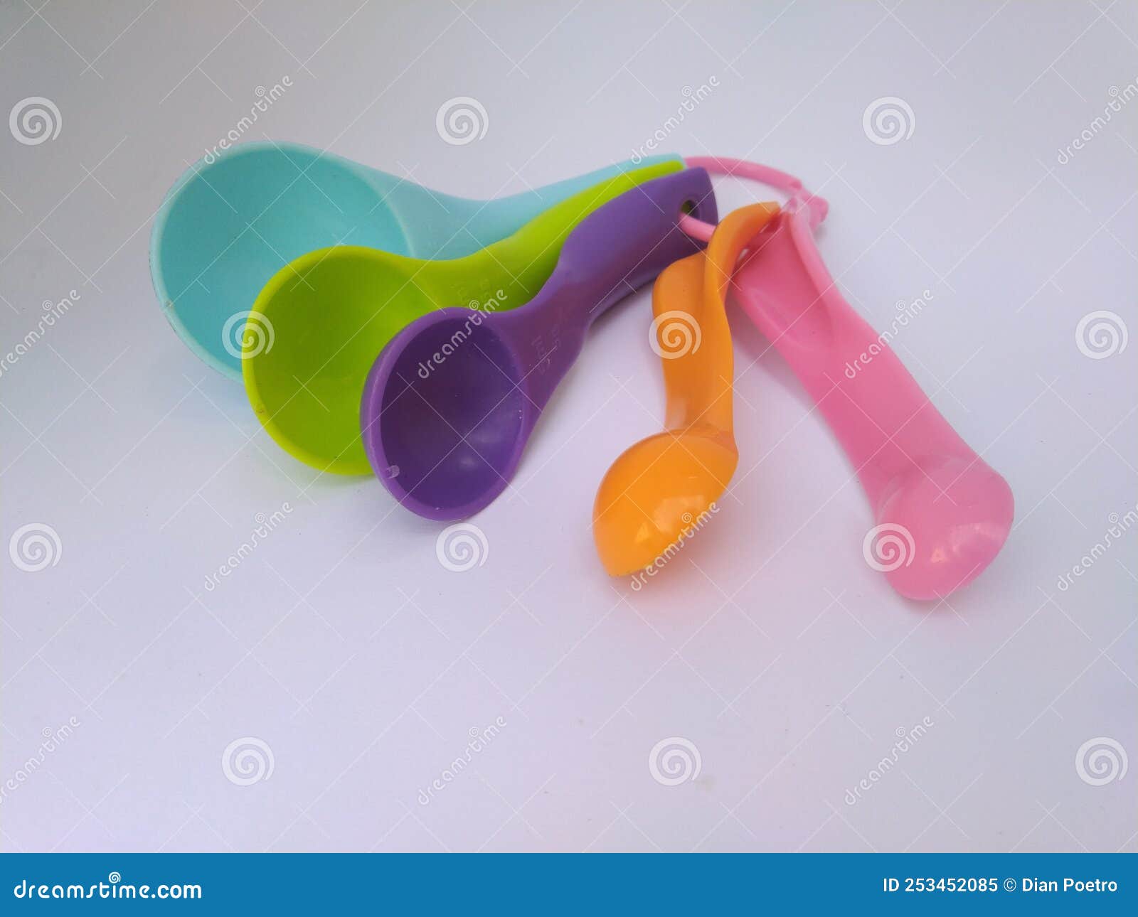 Colorful Measuring Spoons on a White Background Stock Image - Image of ...