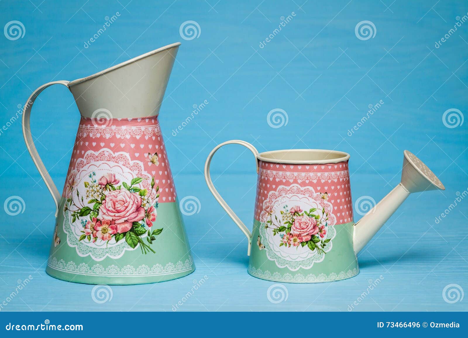 Colorful Metallic Watering Cans with Flower Pattern Stock Photo - Image ...