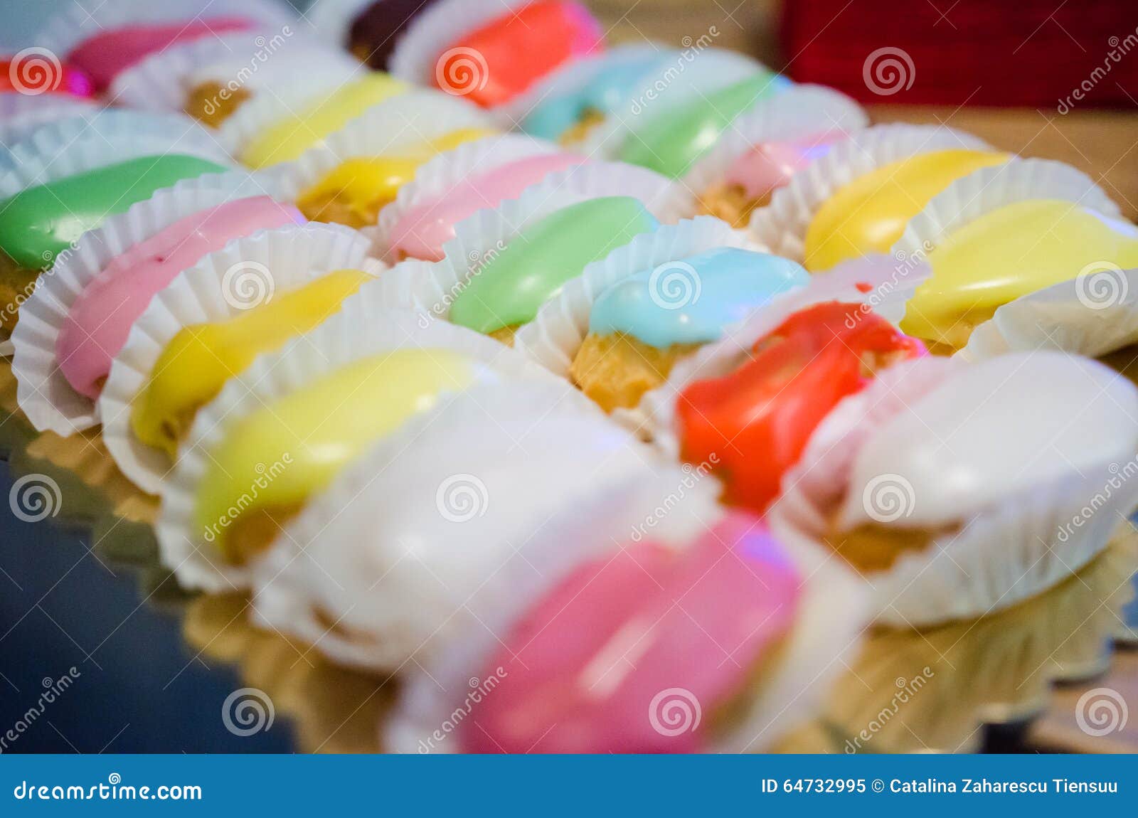 Colorful Mini Eclairs stock image. Image of sugar, plate - 64732995
