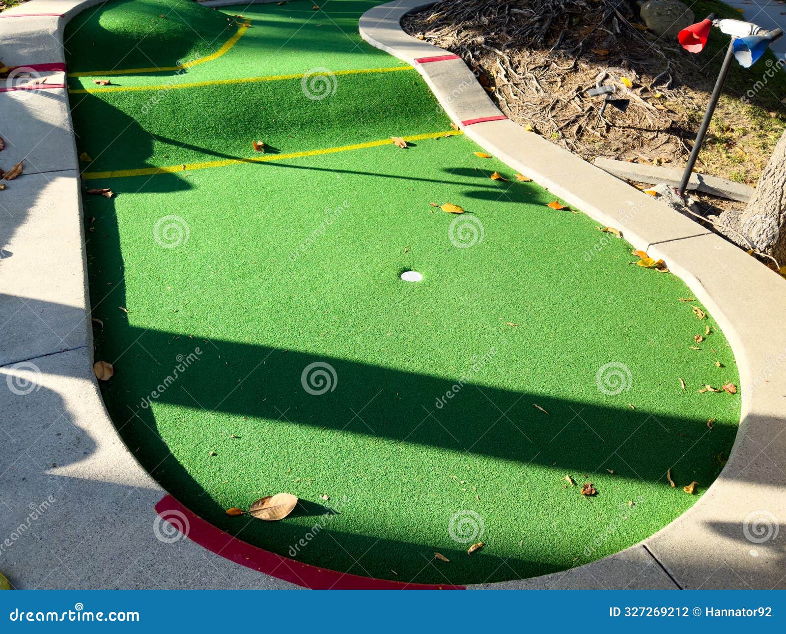 Mini-golf Course with Multiple Holes and Obstacles Surrounded by ...