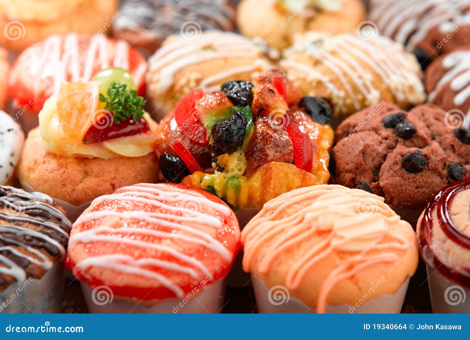 Colorful Muffins Arrangement Stock Photo - Image of fresh, brown: 19340664