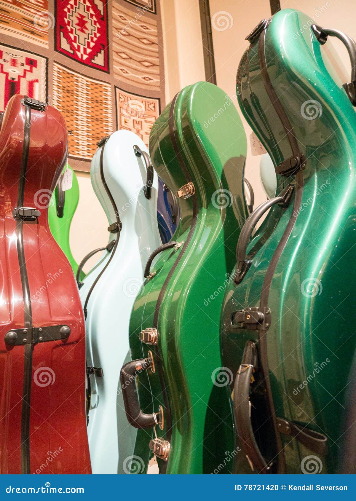 Colorful Multicolor Cello Carrying Cases Standing on Display Stock ...