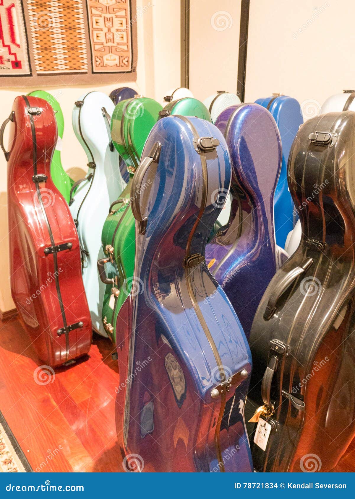 Colorful Multicolor Cello Carrying Cases Standing on Display Stock ...