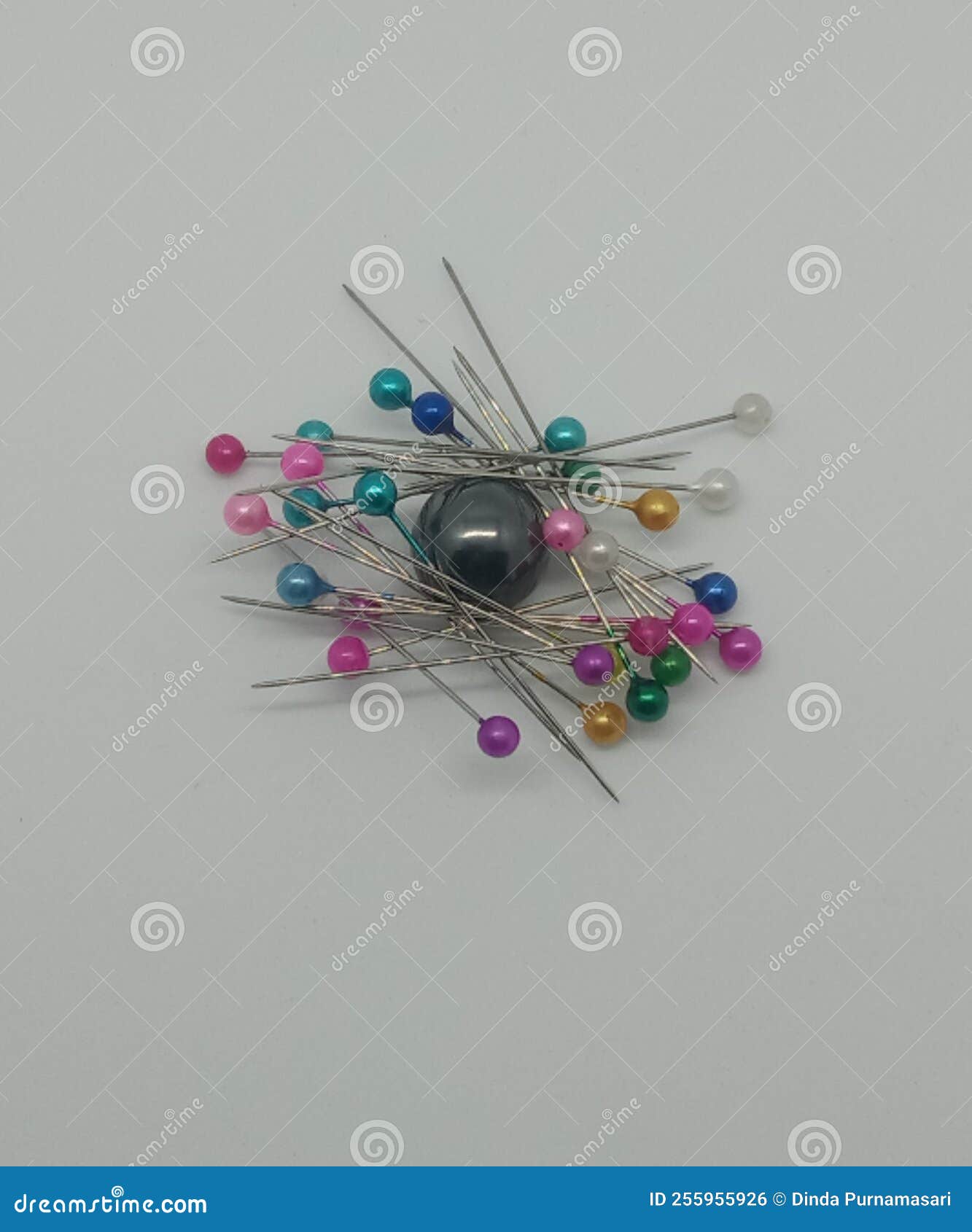 Colorful Needles in Round Magnet on White Background Stock Photo ...