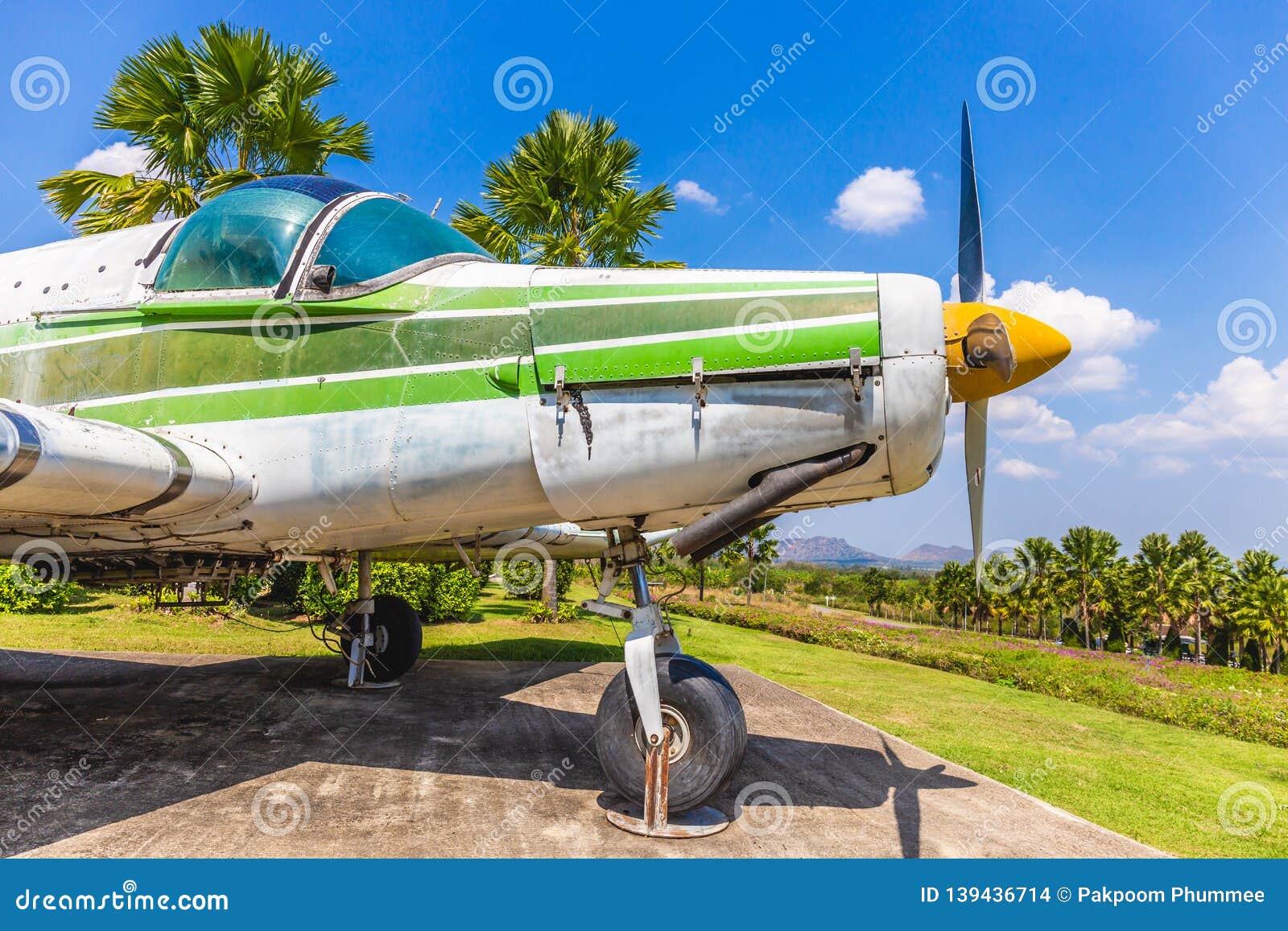 Colorful Old Airplane at Park with Gree Tree and Blue Sky Stock Photo ...
