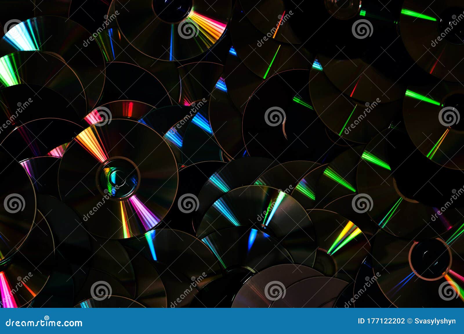 Colorful Old CD DVD Optical Disk Storage Medium with Dust. Dark Image ...