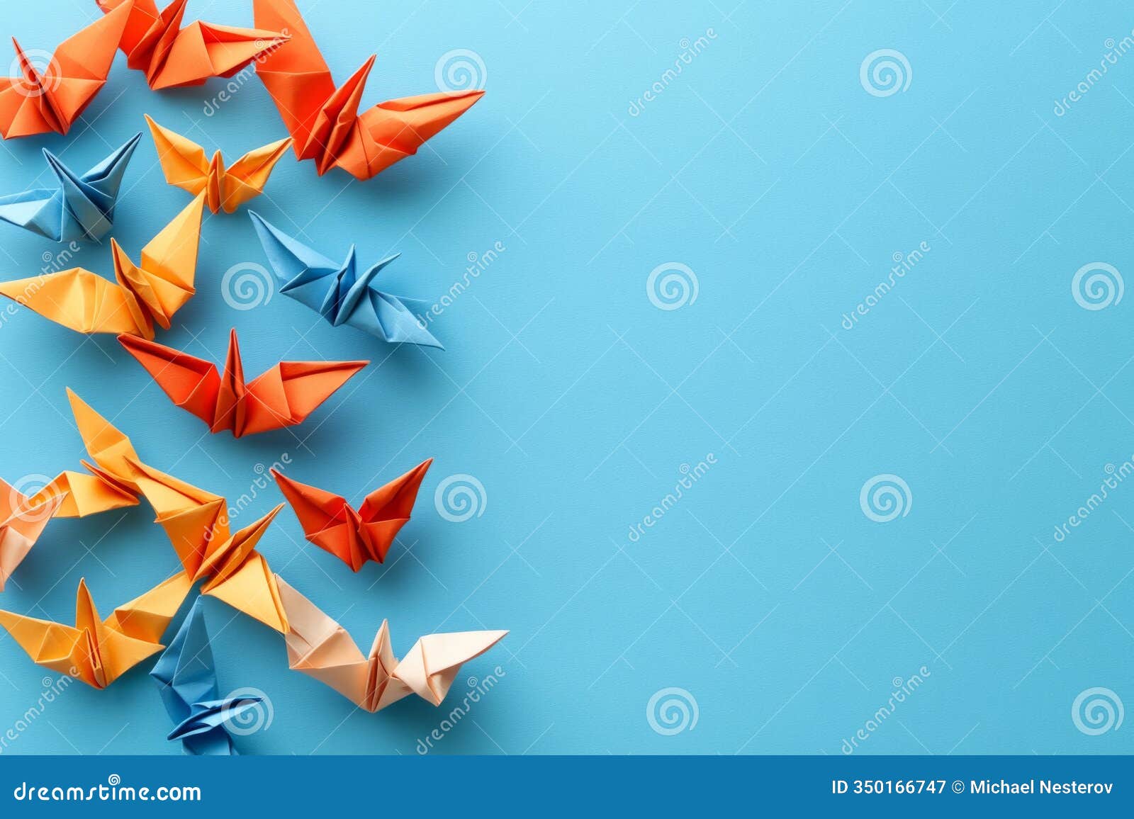 Colorful Origami Birds Flying on Light Blue Background with Copy Space ...