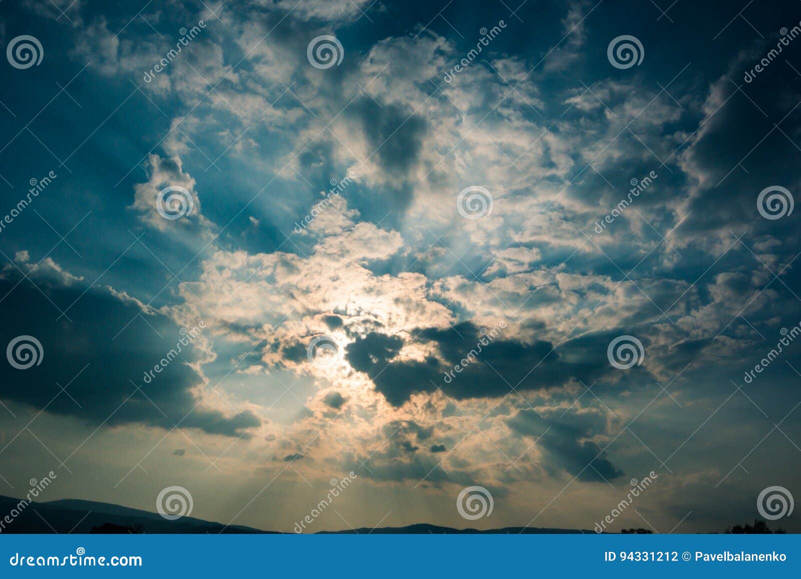 Colorful Overcast Sky with Sun Hiding among Clouds Stock Photo - Image ...