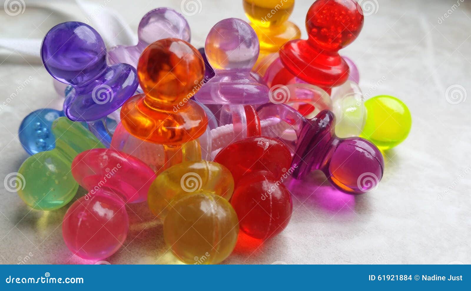 Colorful pacifiers stock photo. Image of fashion, pacifiers - 61921884