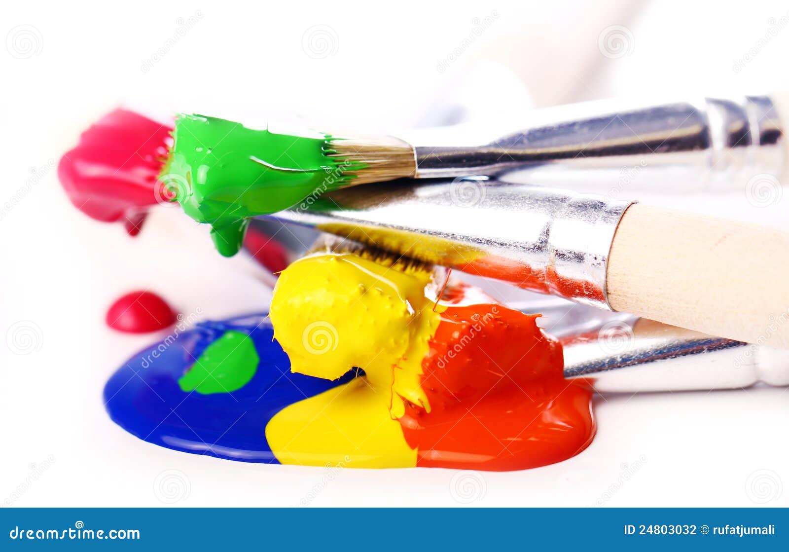 Colorful paint and brushes stock photo. Image of concept - 24803032