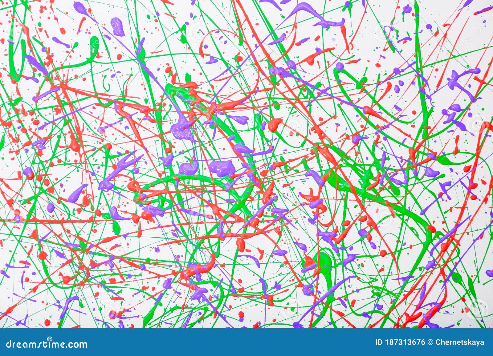 Colorful Paint Splashes on Canvas As Background. Art and Creativity ...