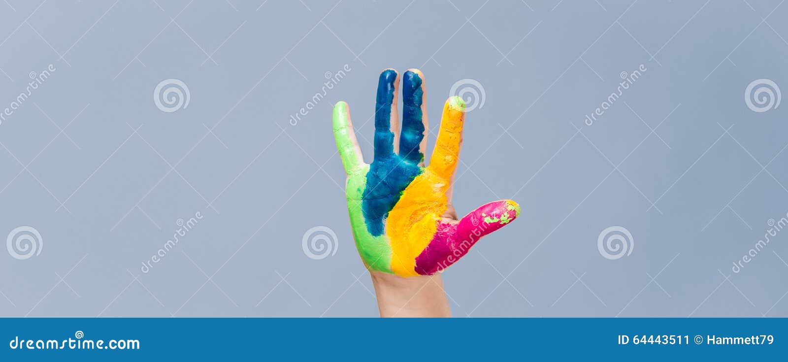 Colorful Painted Hand and Fingers on Blue Background. Stock Image ...