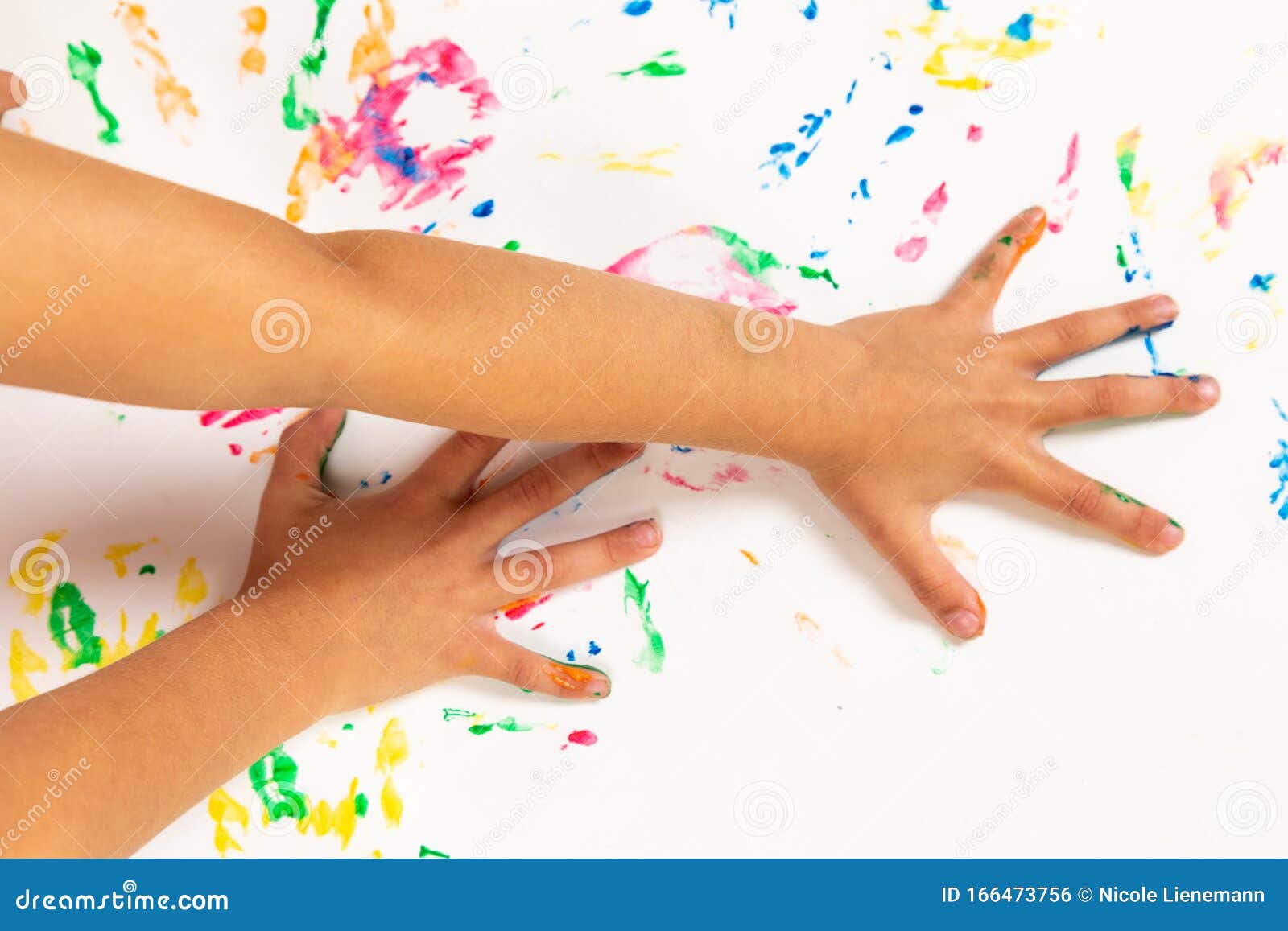 Colorful painted hands stock photo. Image of children - 166473756